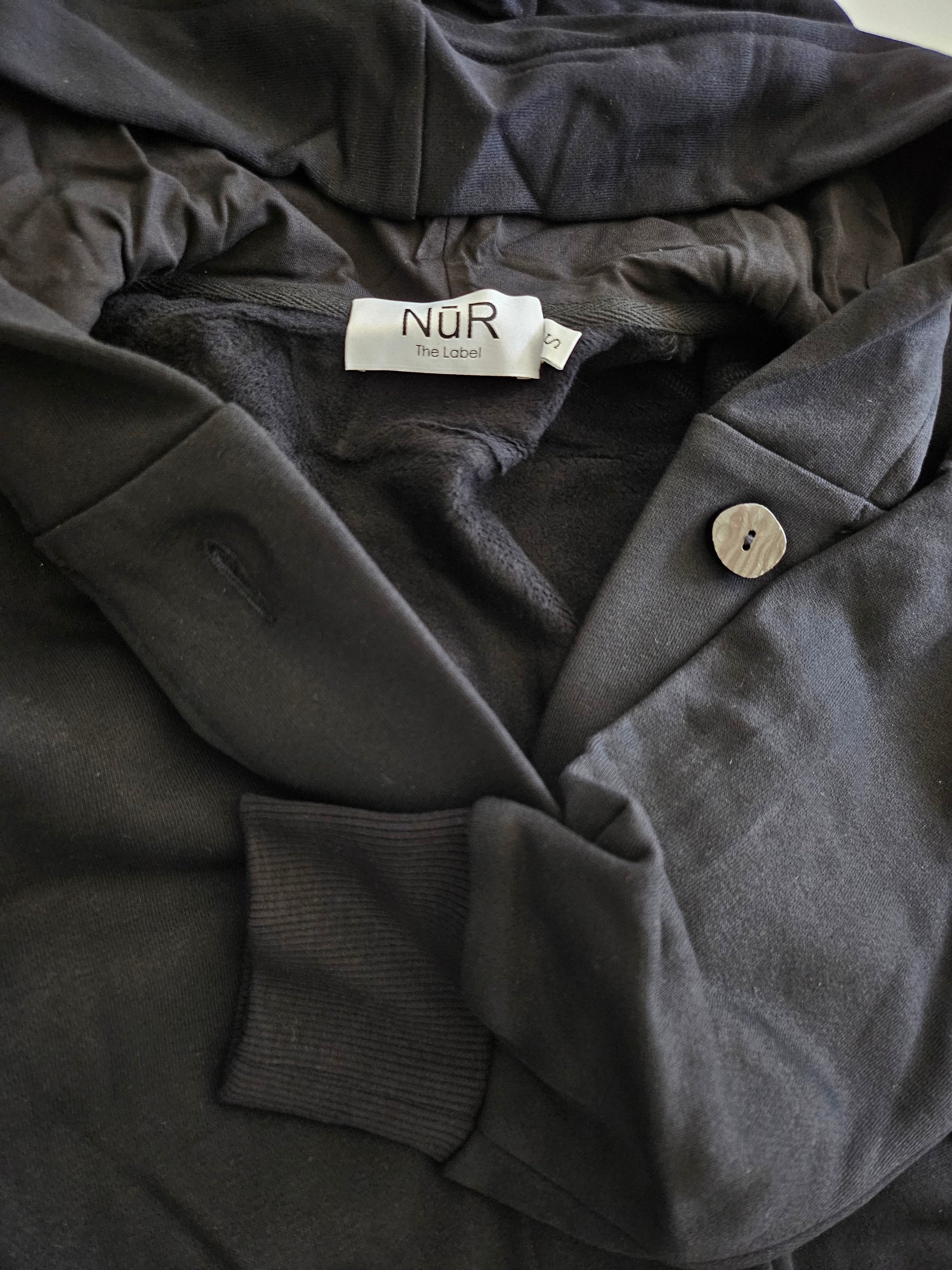 NŪR THE LABEL